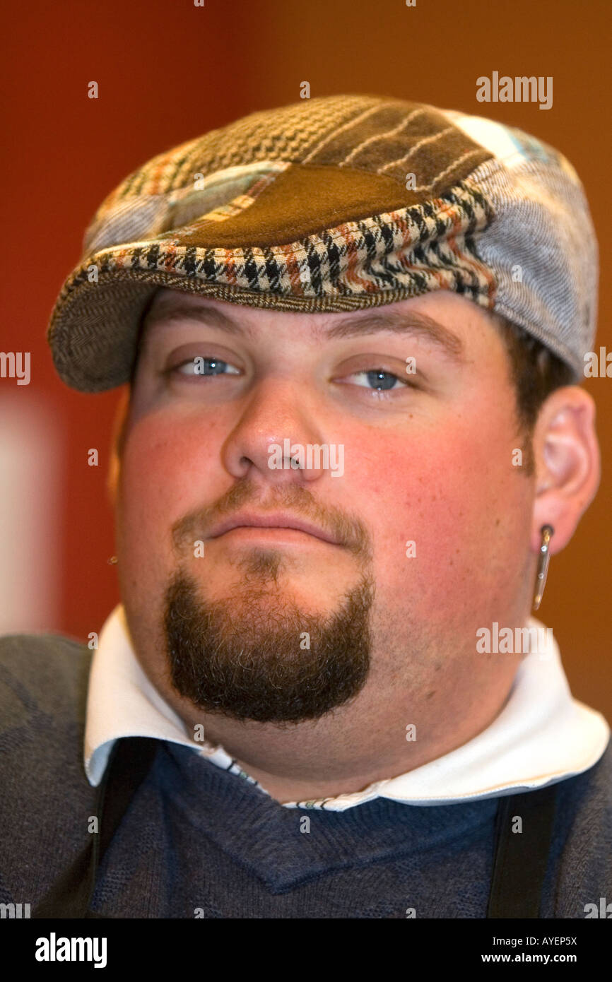 Portrait of a young man wearing a hat Stock Photo - Alamy