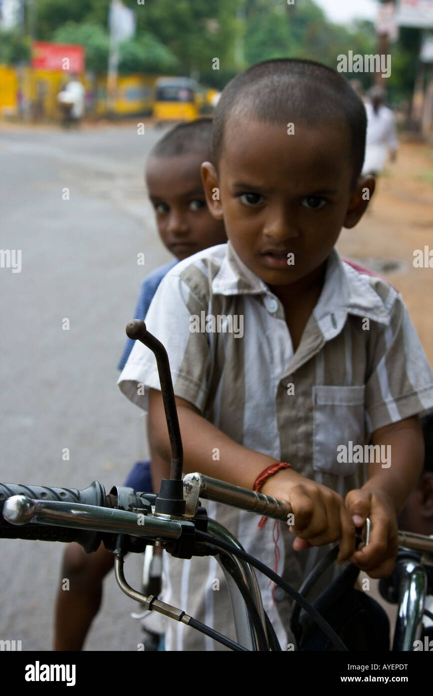 Indian boy on bicycle in hi-res stock photography and images - Alamy