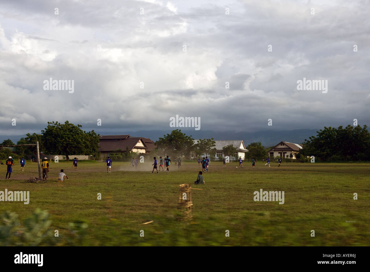 Soccer at sunset Stock Photo - Alamy