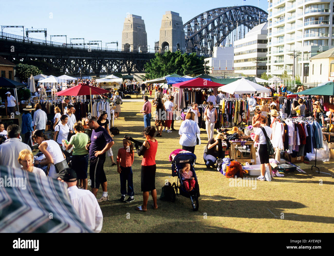 People at busy Kirribilli Market at Milsons Point Sydney Harbour bridge ...