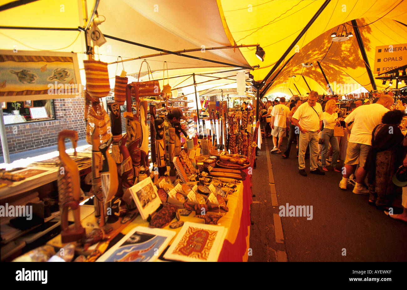 People browsing among the Aboriginal art work displayed at The Rocks ...