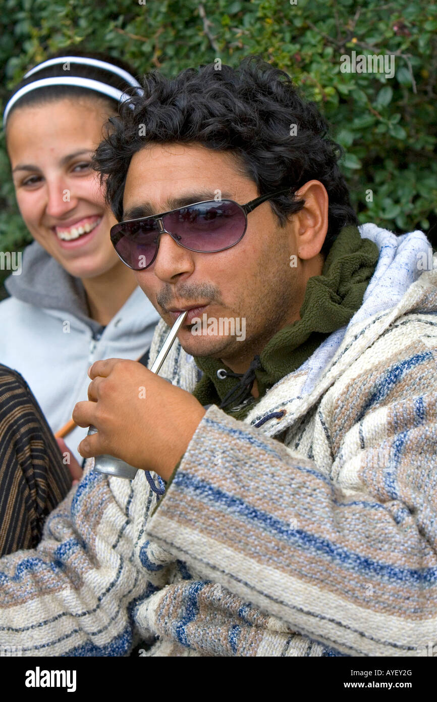 Argentine man drinking mate at the Perito Moreno Glacier in Patagonia ...