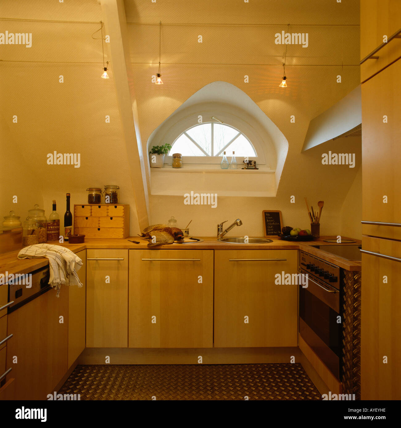 Small attic conversion kitchen Stock Photo - Alamy