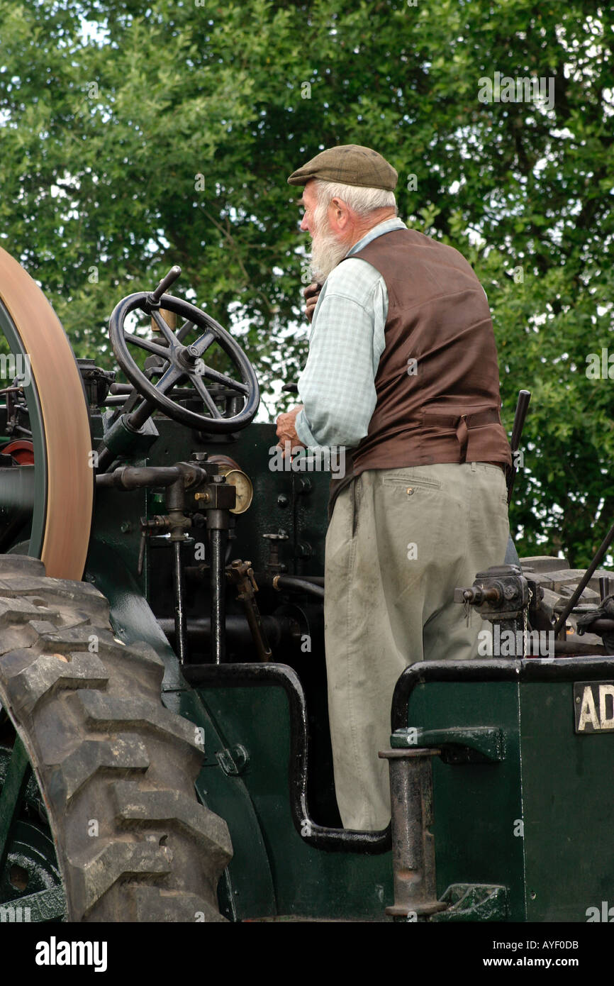 Elderly man running a traction engine Stock Photo - Alamy