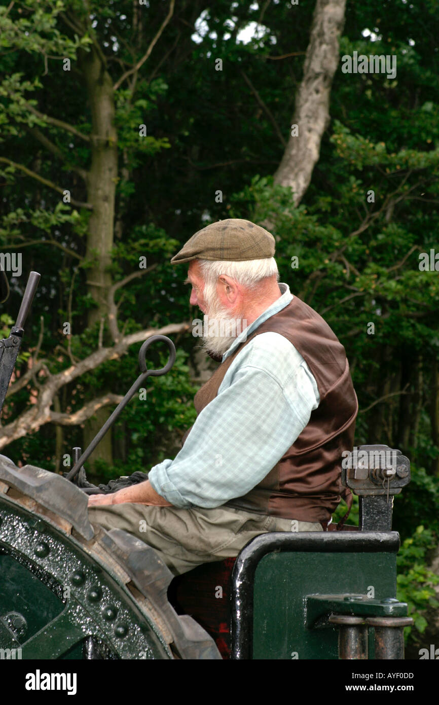 Elderly man running a traction engine Stock Photo - Alamy