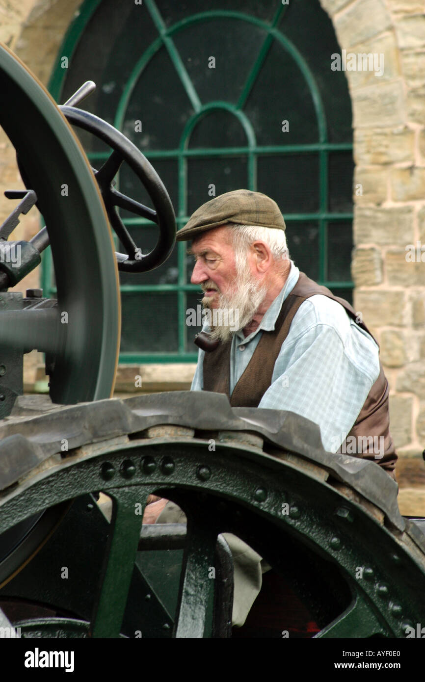 Elderly man running a traction engine Stock Photo - Alamy