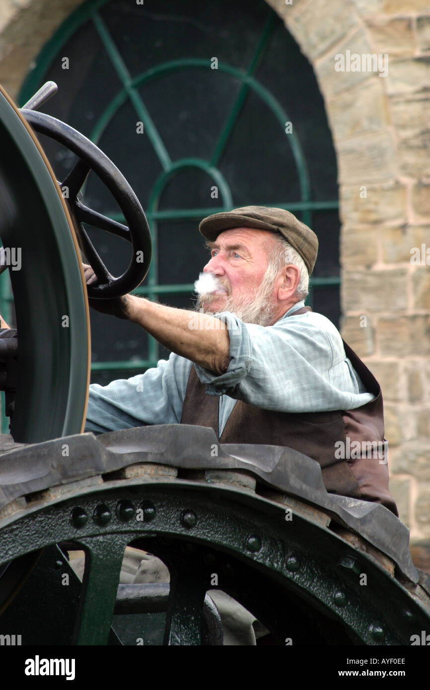 Elderly man running a traction engine Stock Photo - Alamy