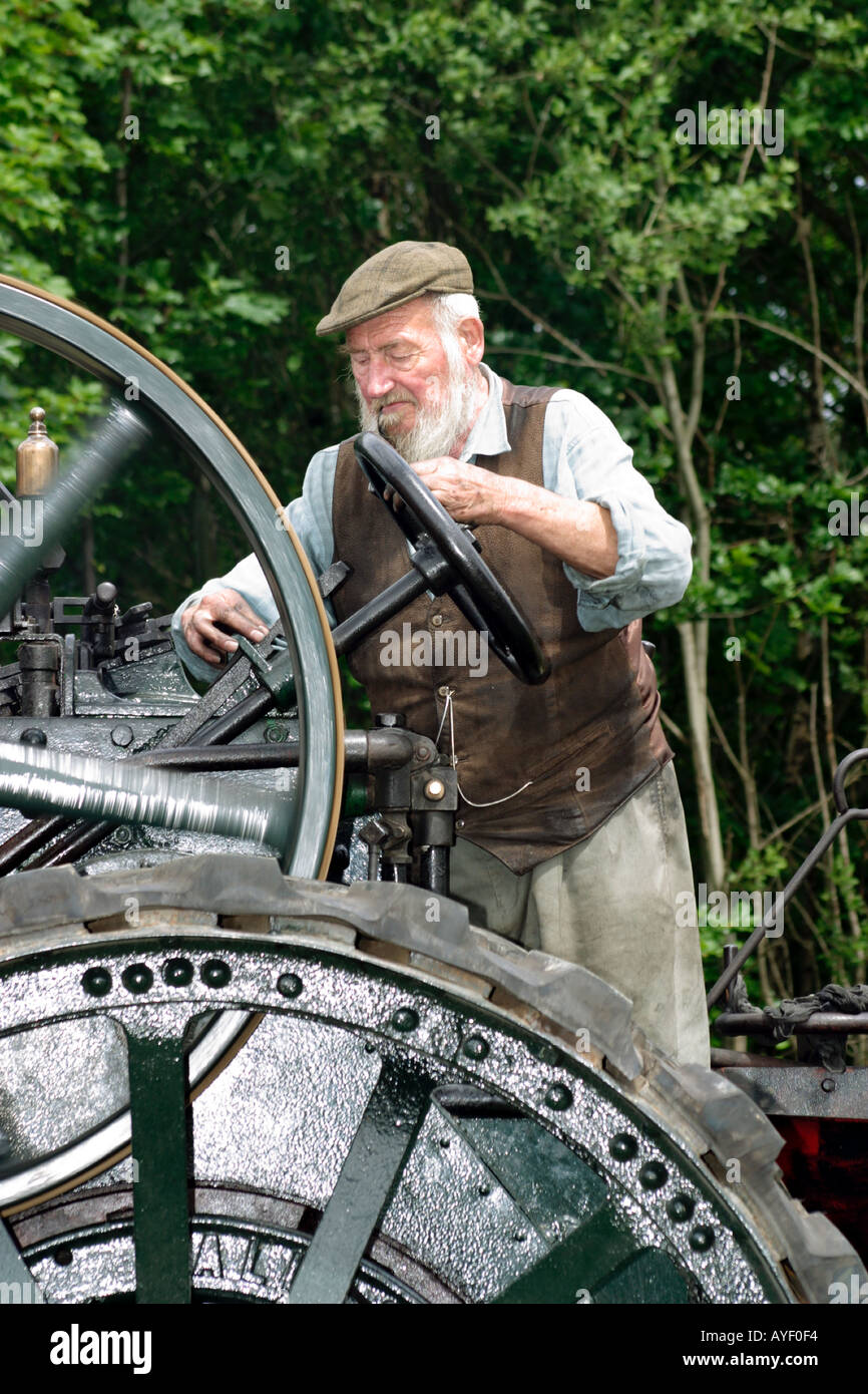 Elderly man running a traction engine Stock Photo - Alamy