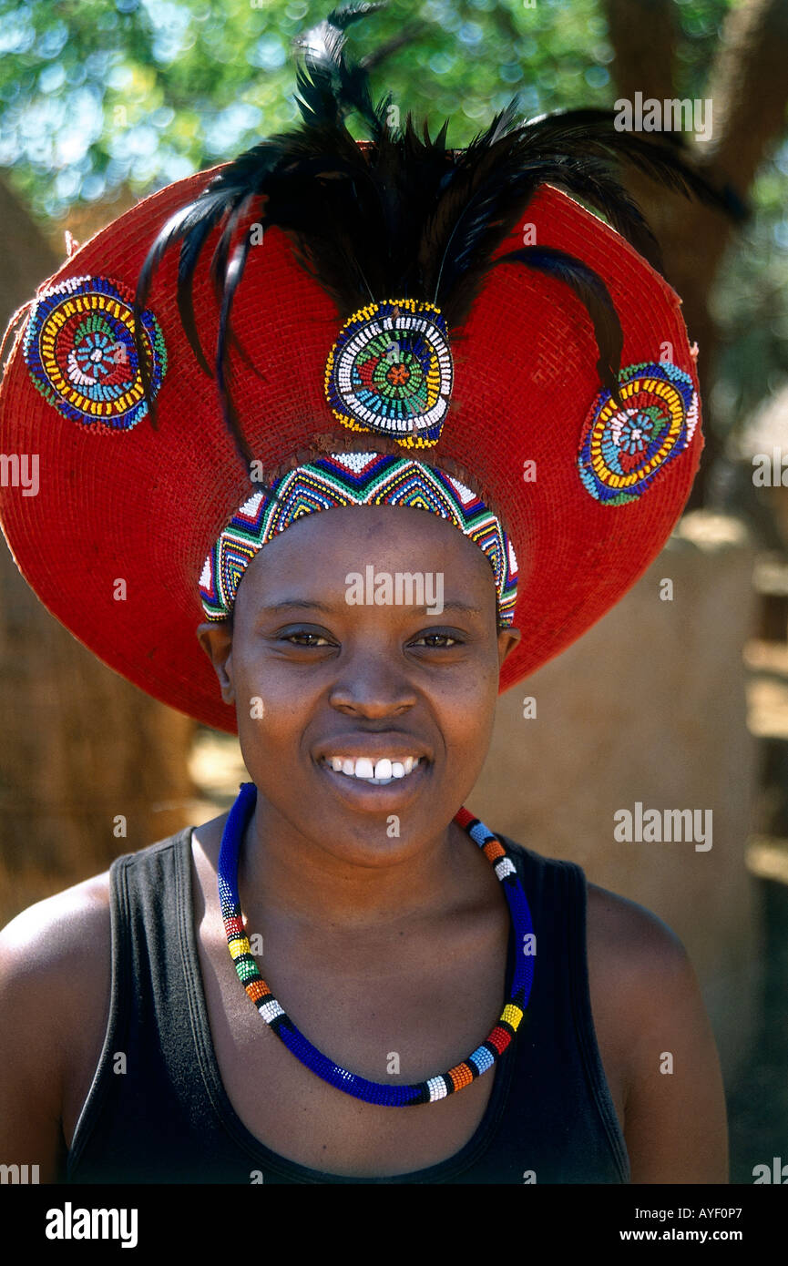 Native lady in very colourful red headdress Shakaland Stock Photo - Alamy