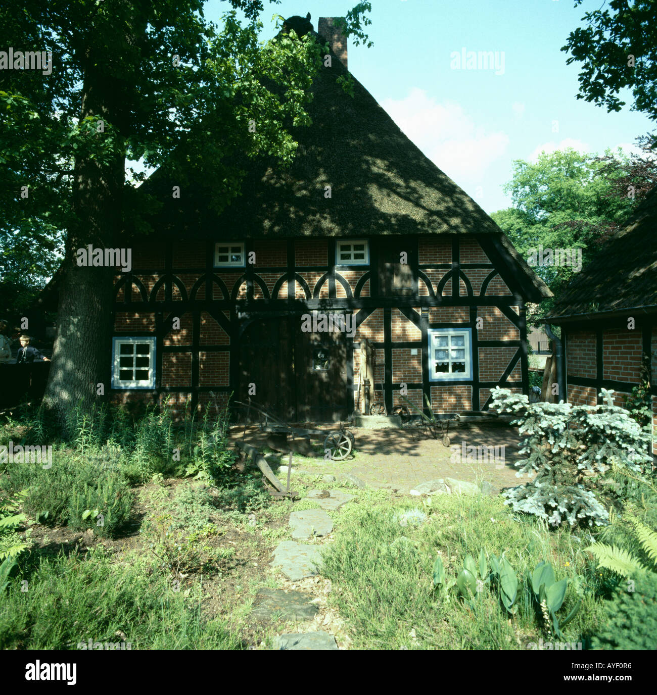 Traditional brick and timbered German cottage Stock Photo - Alamy
