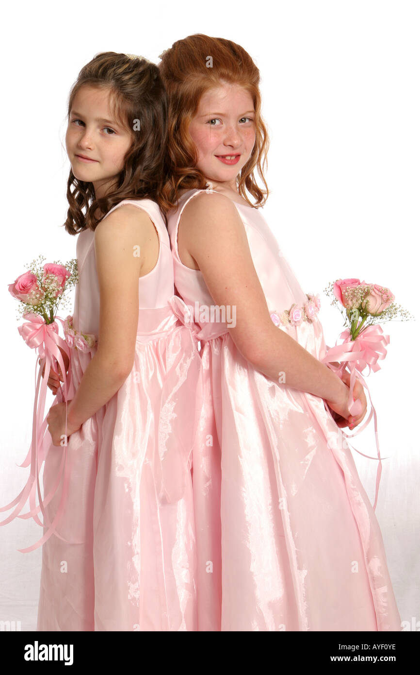 portrait of two sisters back to back Stock Photo - Alamy