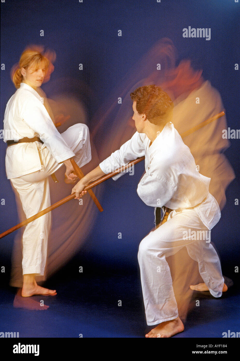 karate blackbelts dueling with ancient weapons Stock Photo - Alamy