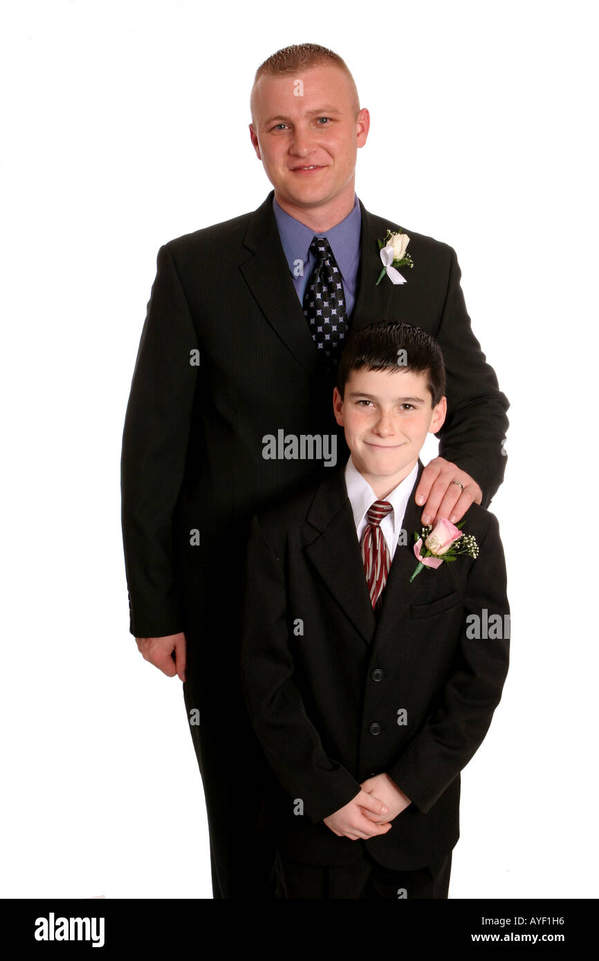 Happy family in suits hi-res stock photography and images - Alamy