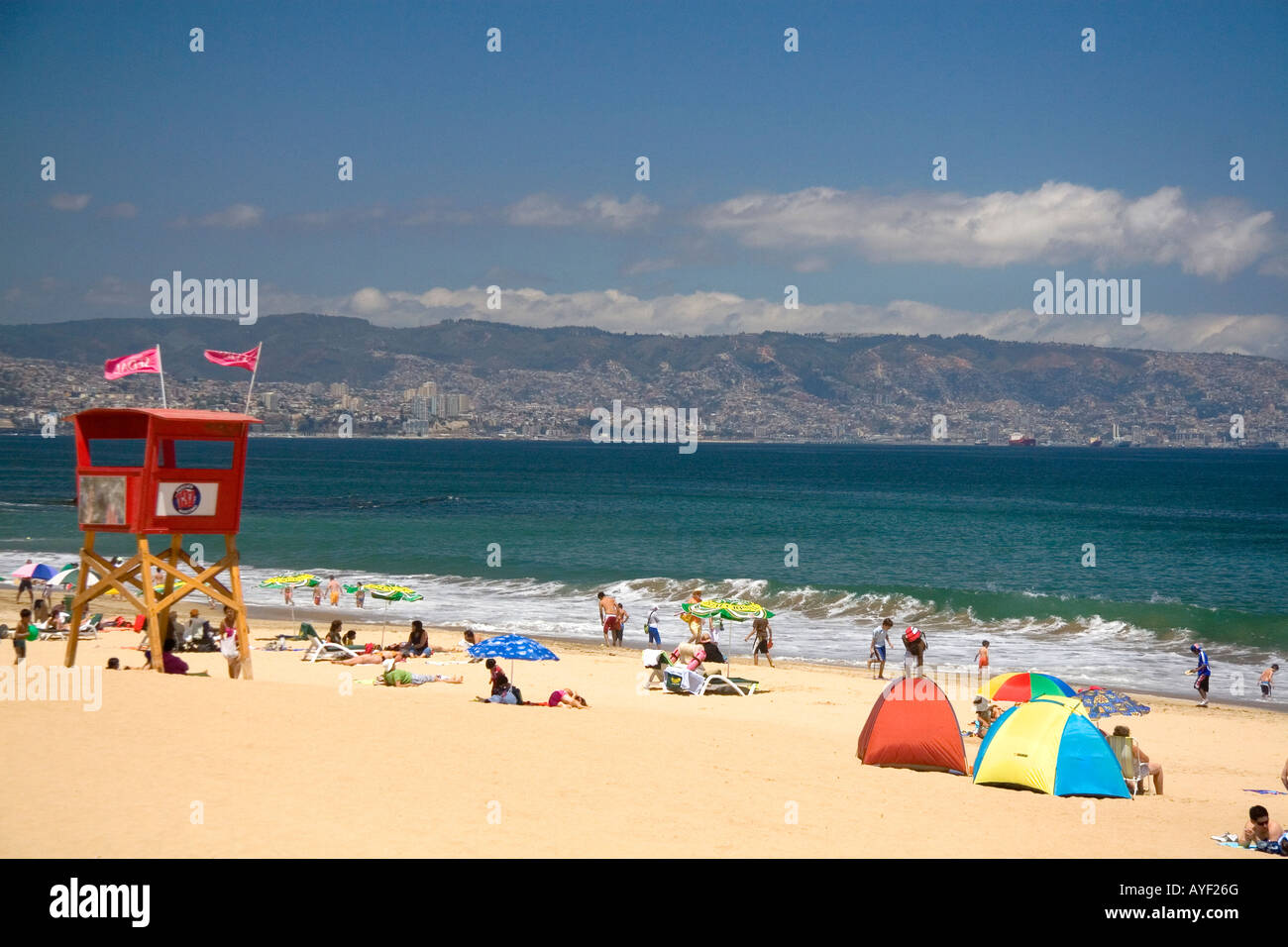Beach scene in Renaca on the Pacific Ocean in Chile with Vina del Mar ...