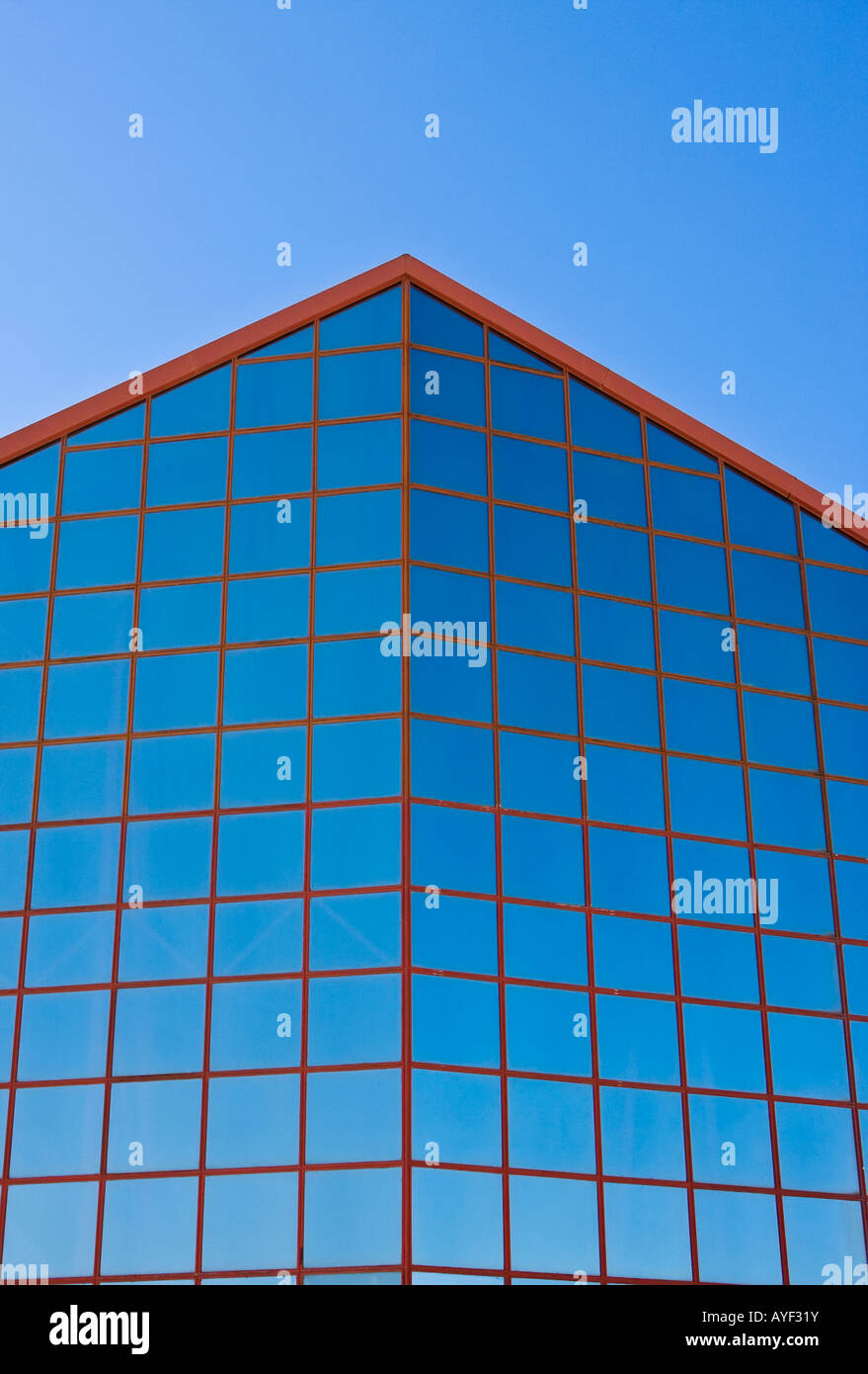 Blue windows from office building against blue sky Stock Photo - Alamy