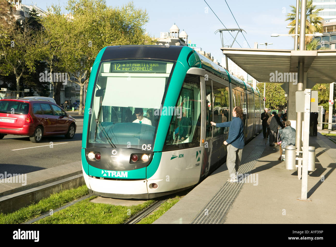 Barcelona tram running through the city Stock Photo - Alamy