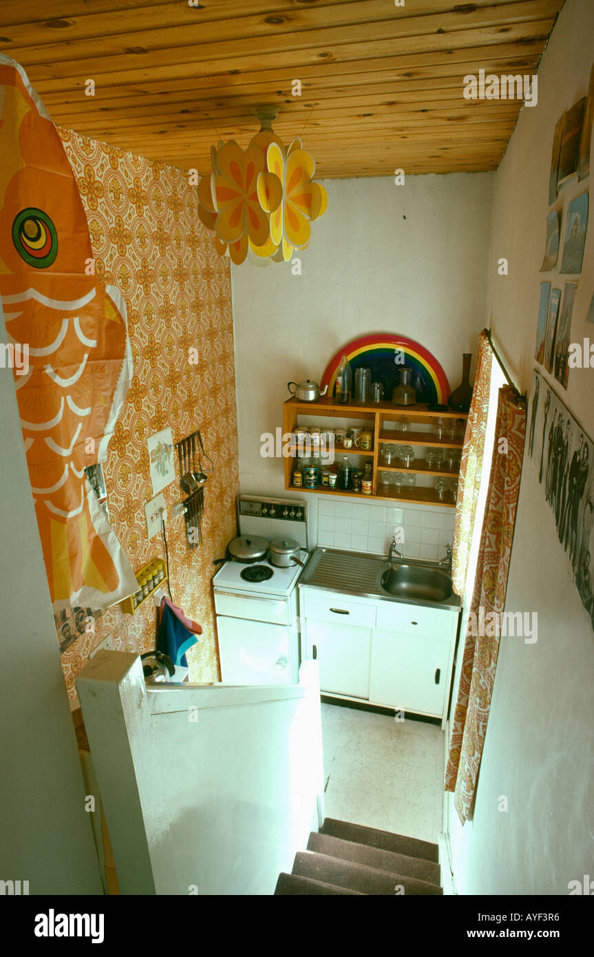 Seventies kitchen with orange tiled walls Stock Photo - Alamy