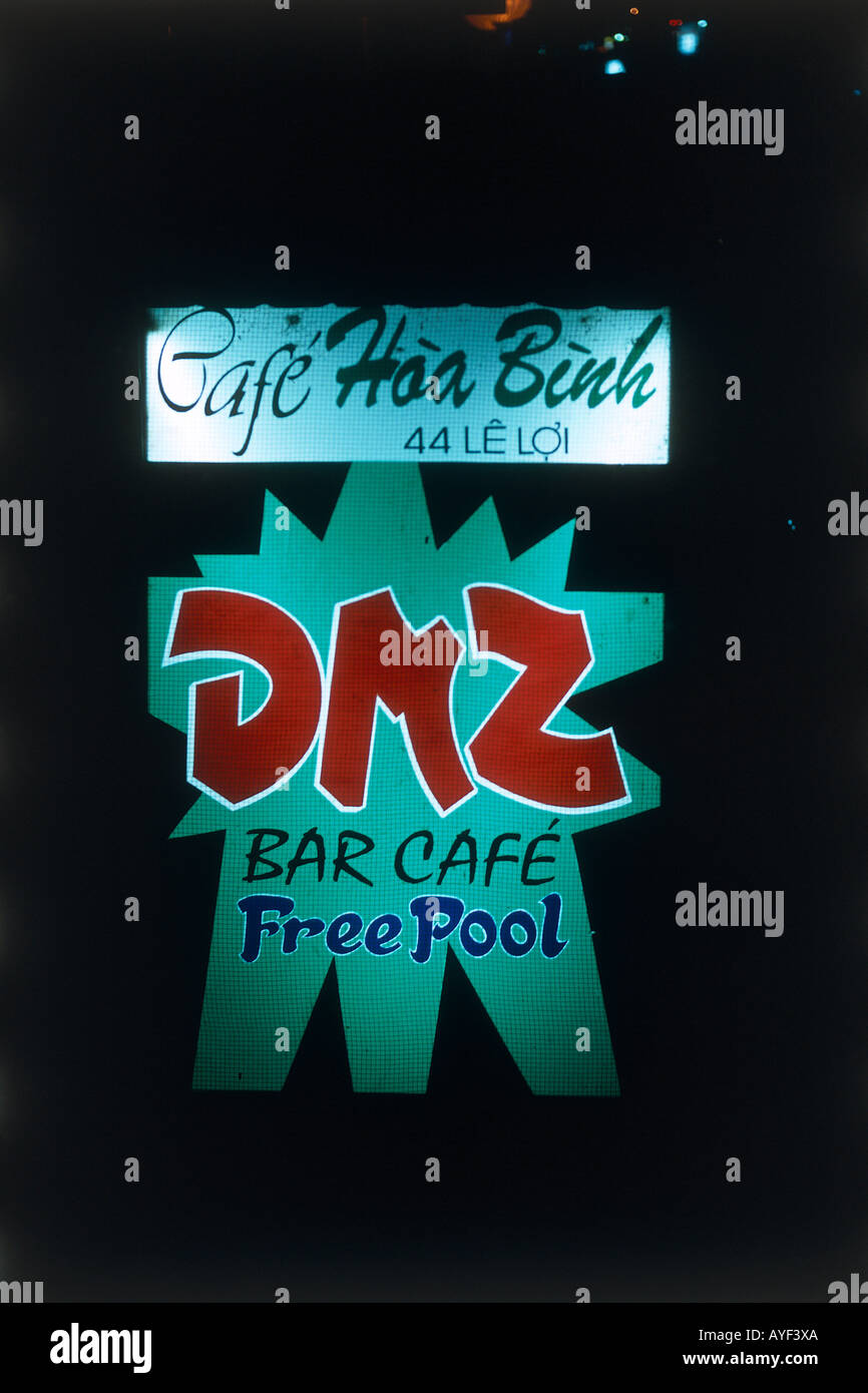 Neon light of DMZ Bar Hue sign Stock Photo - Alamy