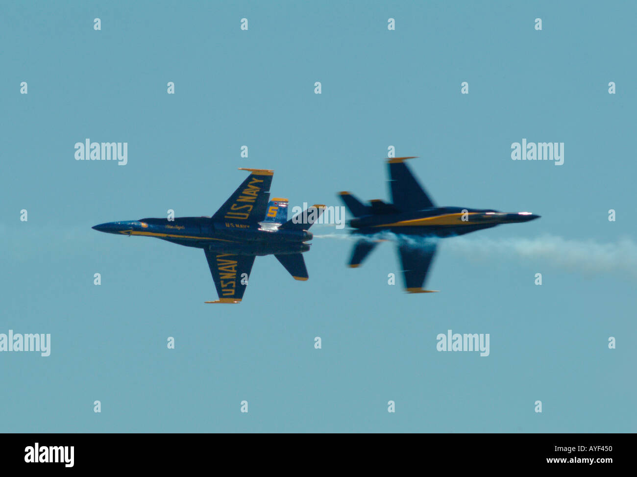 The Blue Angels jet squadron perform a tight passing stunt This is not ...