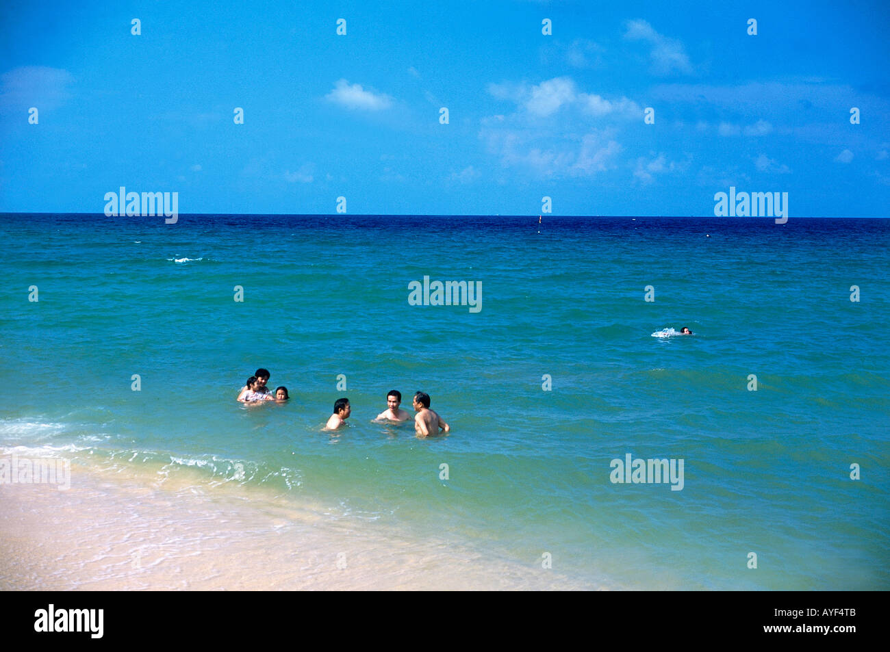 People bathing in the sea at at Long Beach Phu Quoc Stock Photo - Alamy