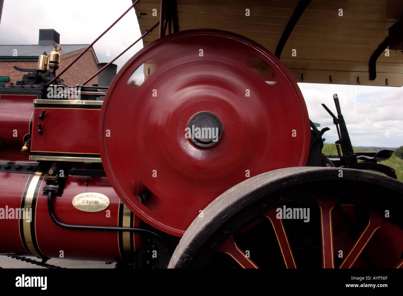 Eve a Fowler steamroller with spinning flywheel Stock Photo - Alamy