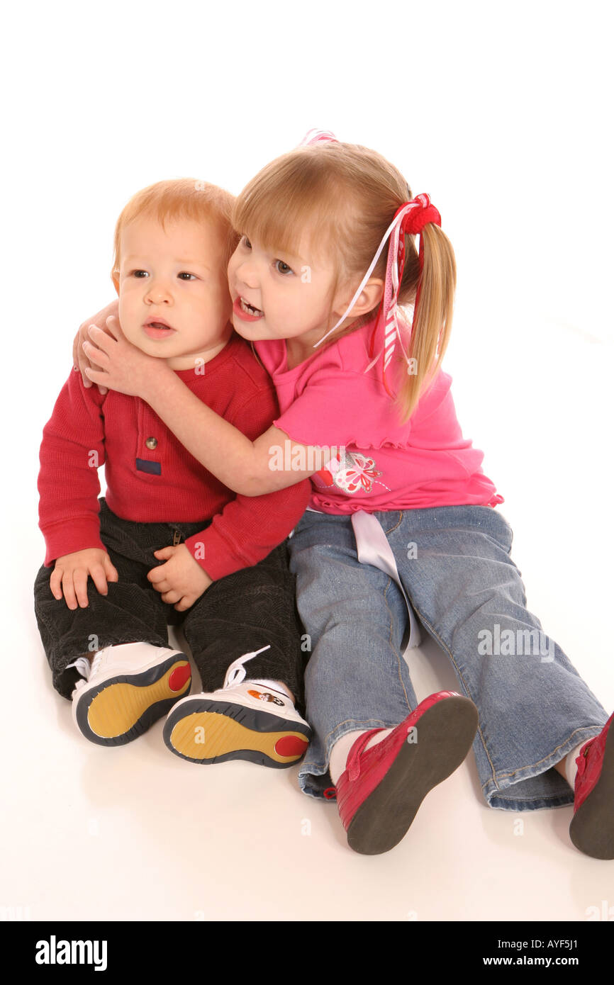 two siblings hugging Stock Photo - Alamy