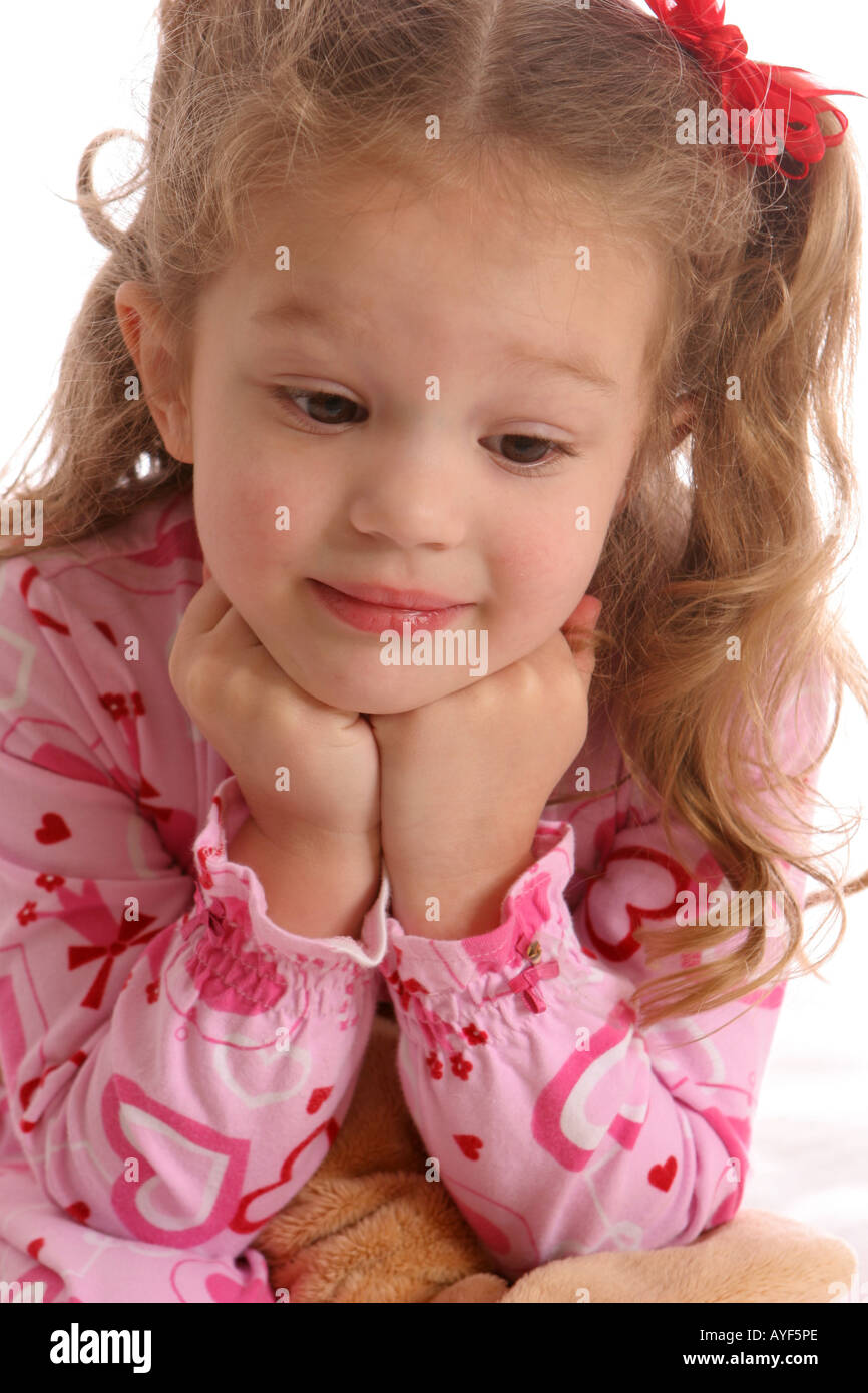 little Girl looking downward Stock Photo - Alamy