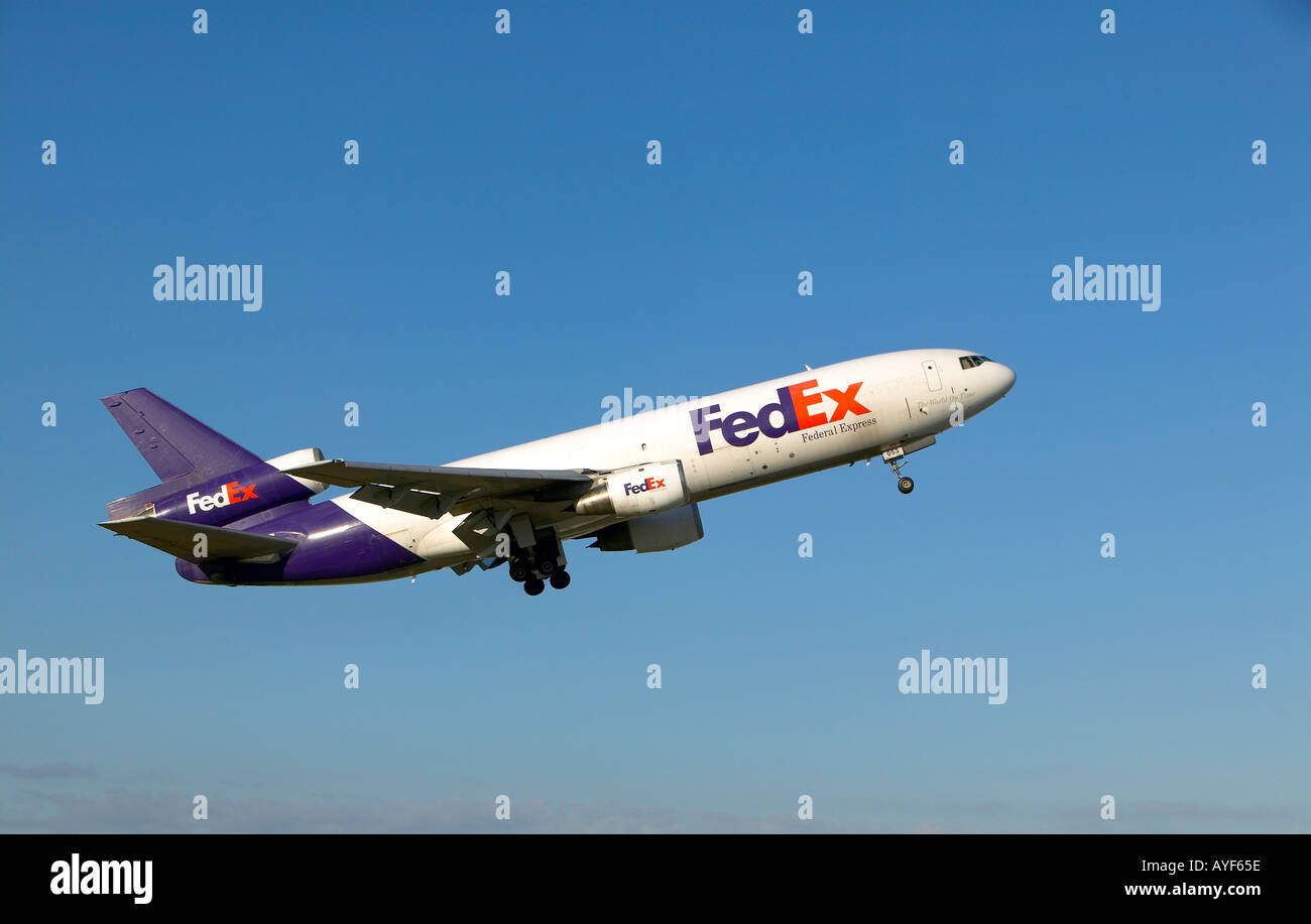 Side view of Federal Express delivery service s airplane in the sky ...