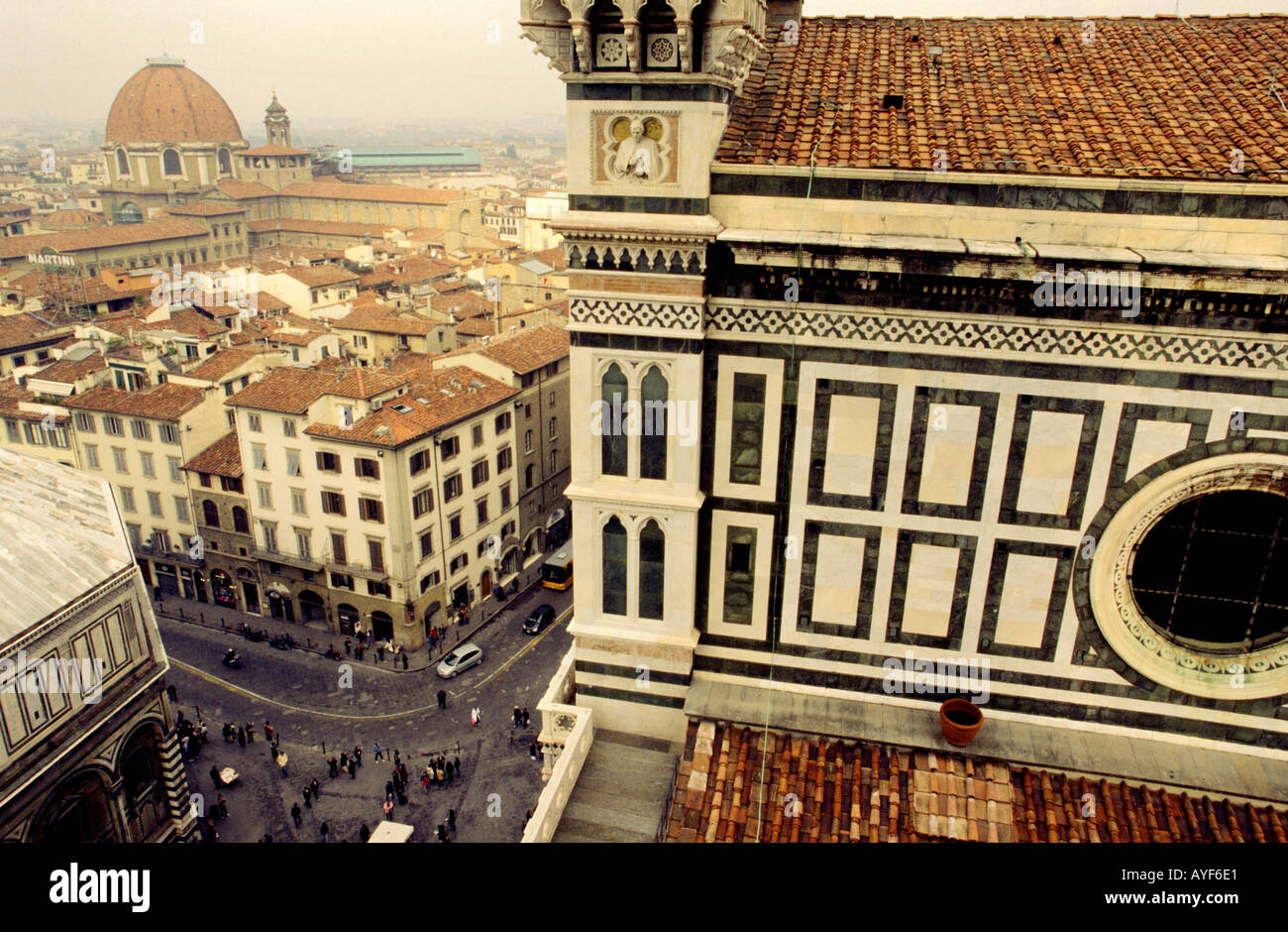 Front plaza side rooftop and ornate walls of Duomo the old city in the ...
