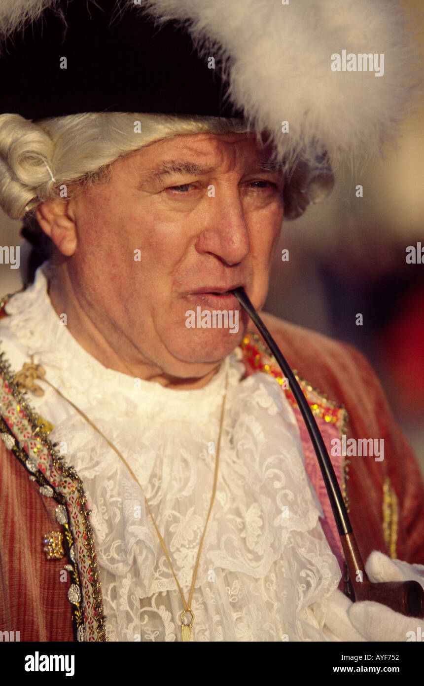 Portrait of a male smoking a pipe dressed in baron like costume for a ...