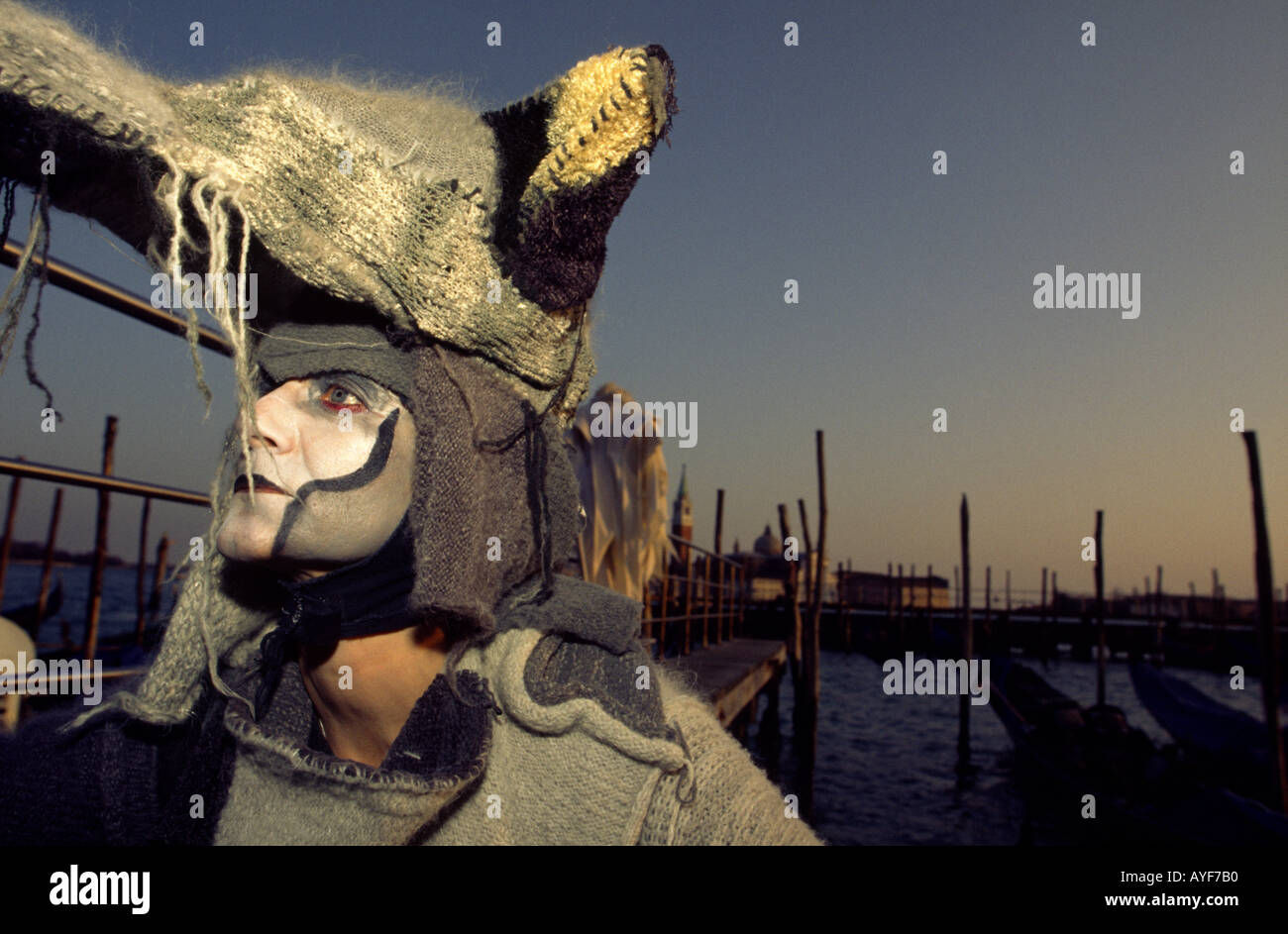 Female street performer dressed in a wolf like costume at masquerade ...