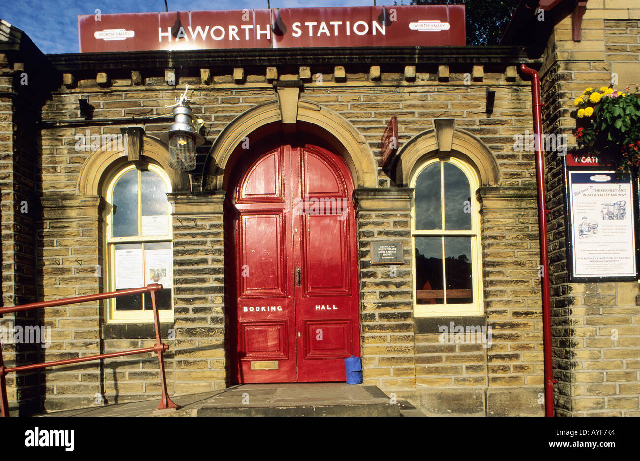 Exterior of Haworth railway station that has large red doors Stock ...