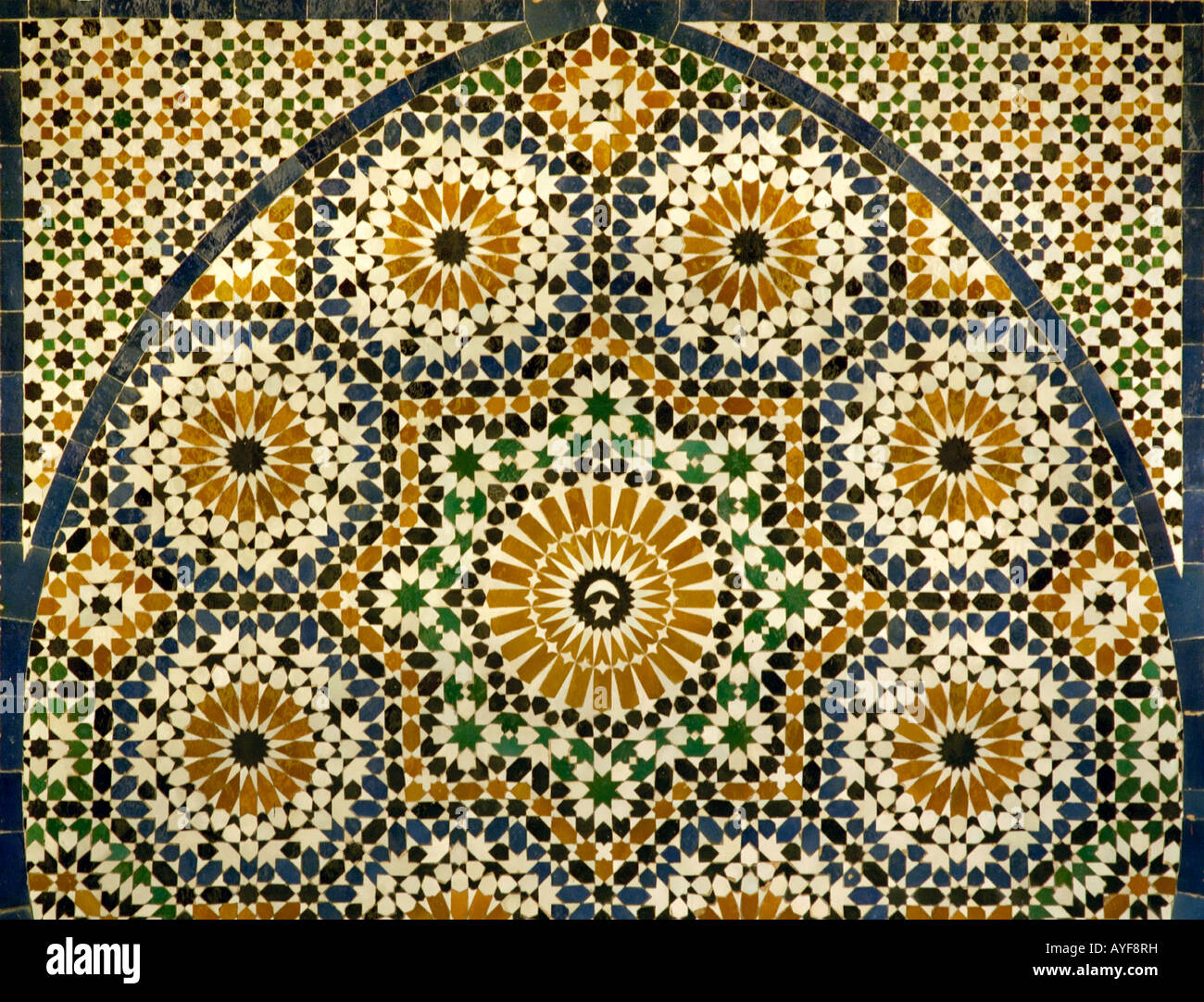 Zelij mosaic on a wall museum of Marrakech Morocco Stock Photo - Alamy