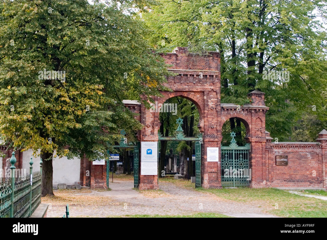 Arched entry gates into the Historic Lodz Jewish Cemetery. Lodz Central ...