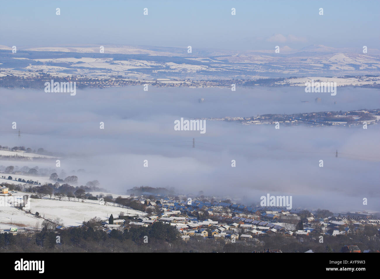 Blackburn and Darwen from Darwen Tower in winter snow and cloud ...