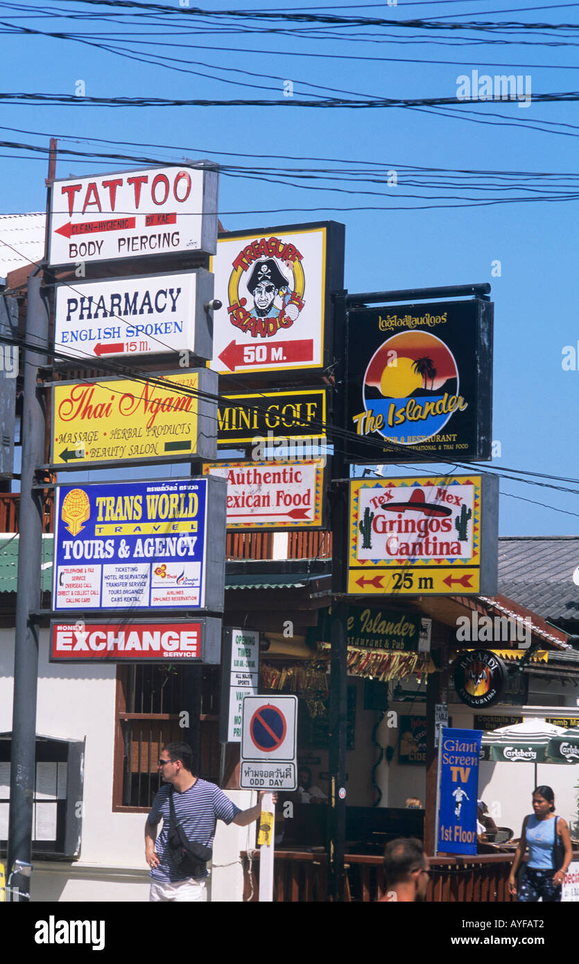 A mass of advertising signs in downtown Chaweng on Ko Samui Stock Photo ...