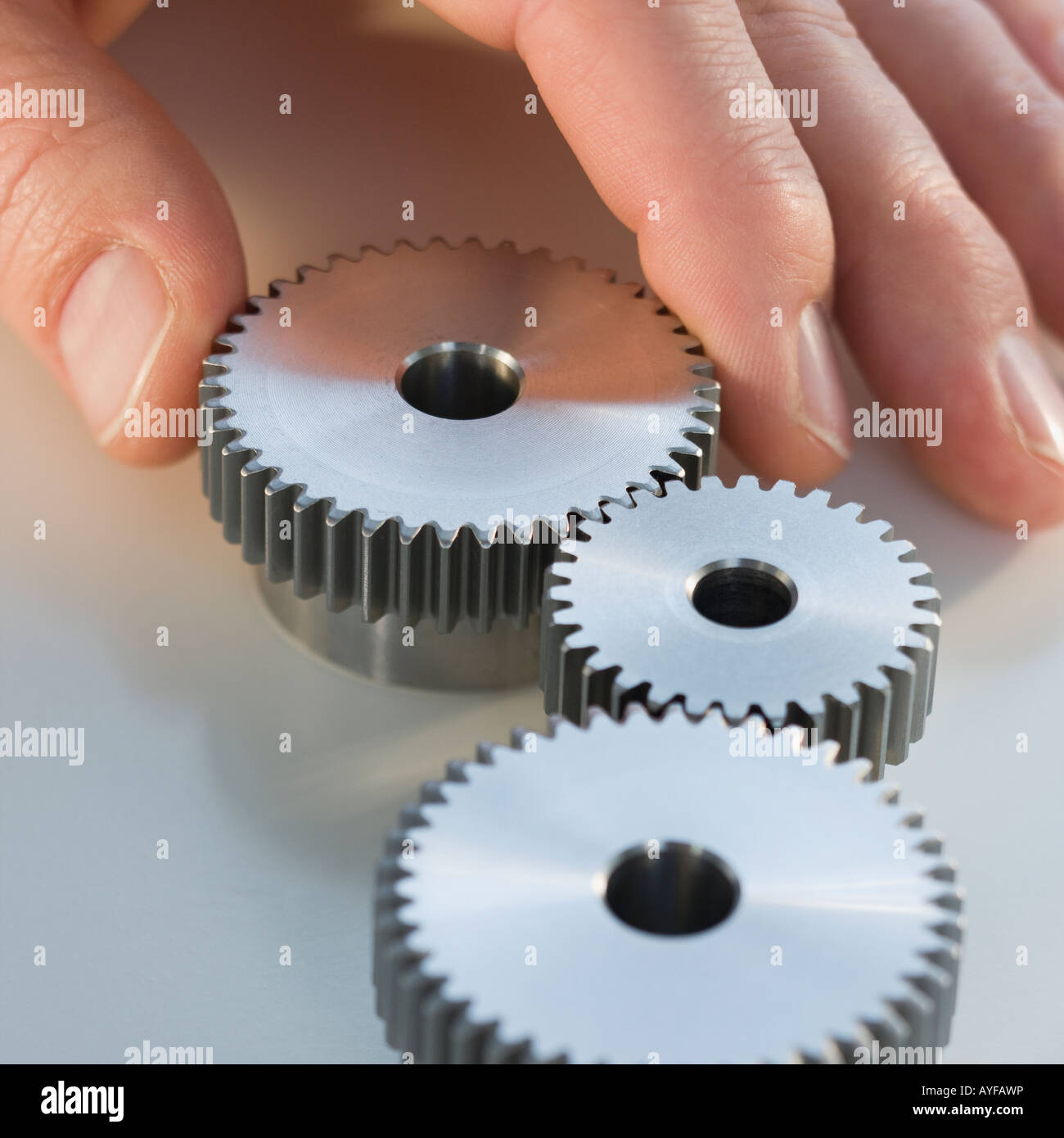 Spinning cog wheels hi-res stock photography and images - Alamy