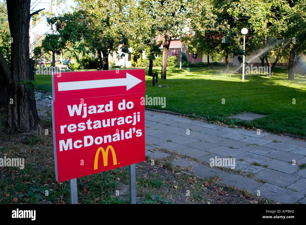 Directional sign for McDonald's drive-up entrance. Lodz Central Poland ...
