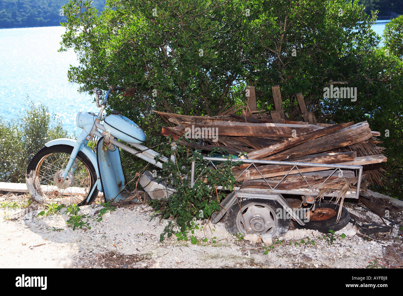 An old three wheel motorbike with carrier facilities Stock Photo - Alamy
