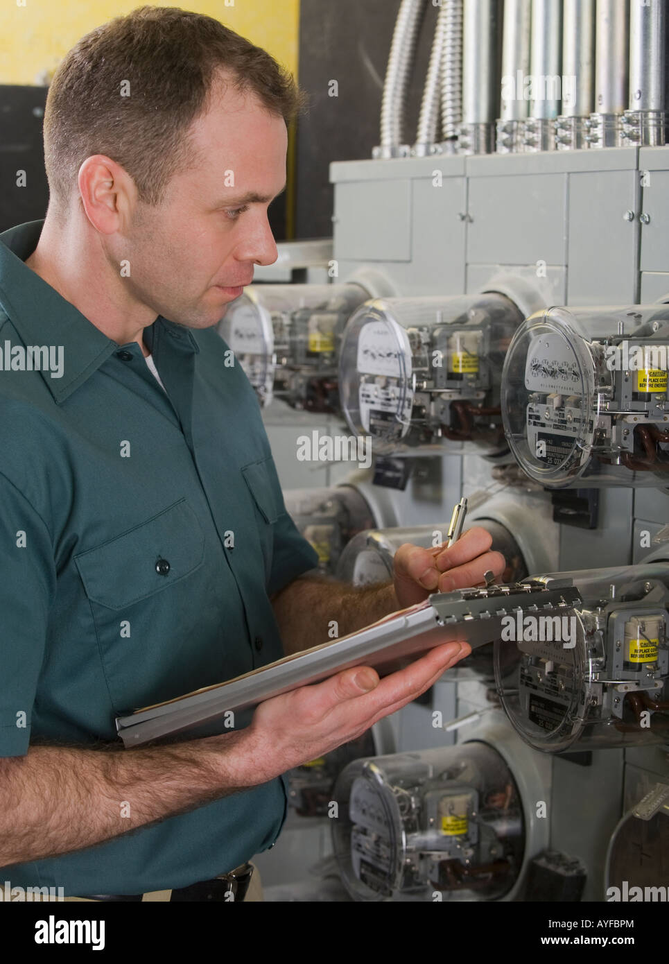 Man reading an electric meter hi-res stock photography and images - Alamy