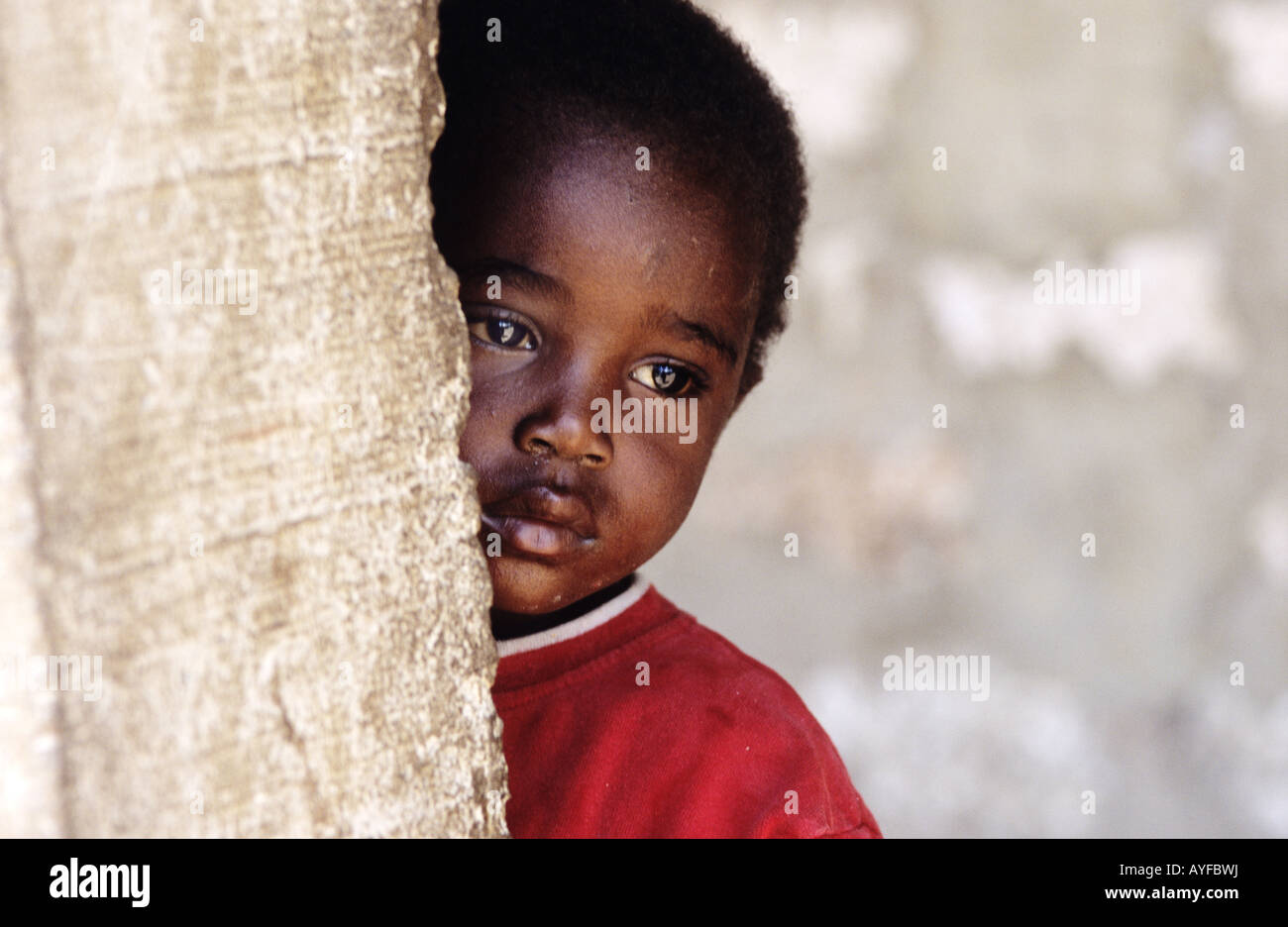 Kenya Africa Sad young boy Stock Photo - Alamy