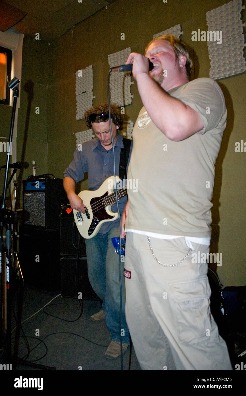 Lead singer and base player at practice session of the Intercontinental ...