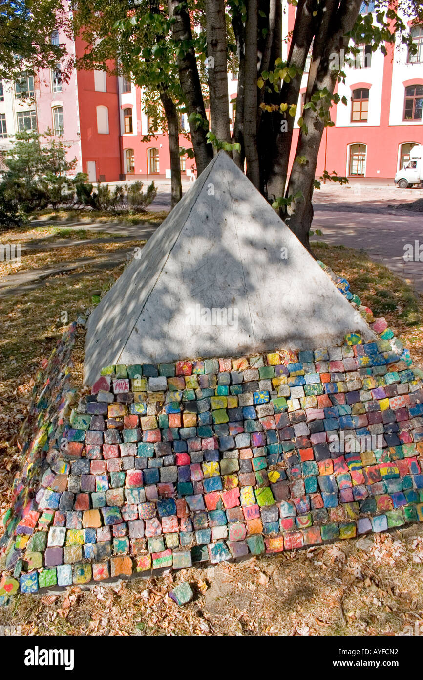 Mosaic pyramid sculpture on school campus. Academy of Humanities and ...
