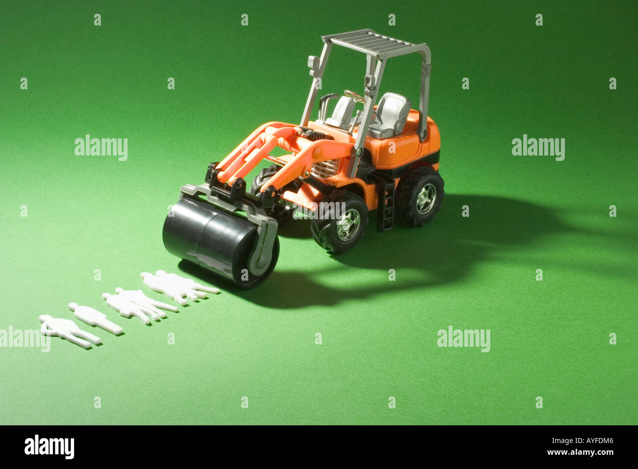 Figures and Miniature Road Roller Stock Photo - Alamy