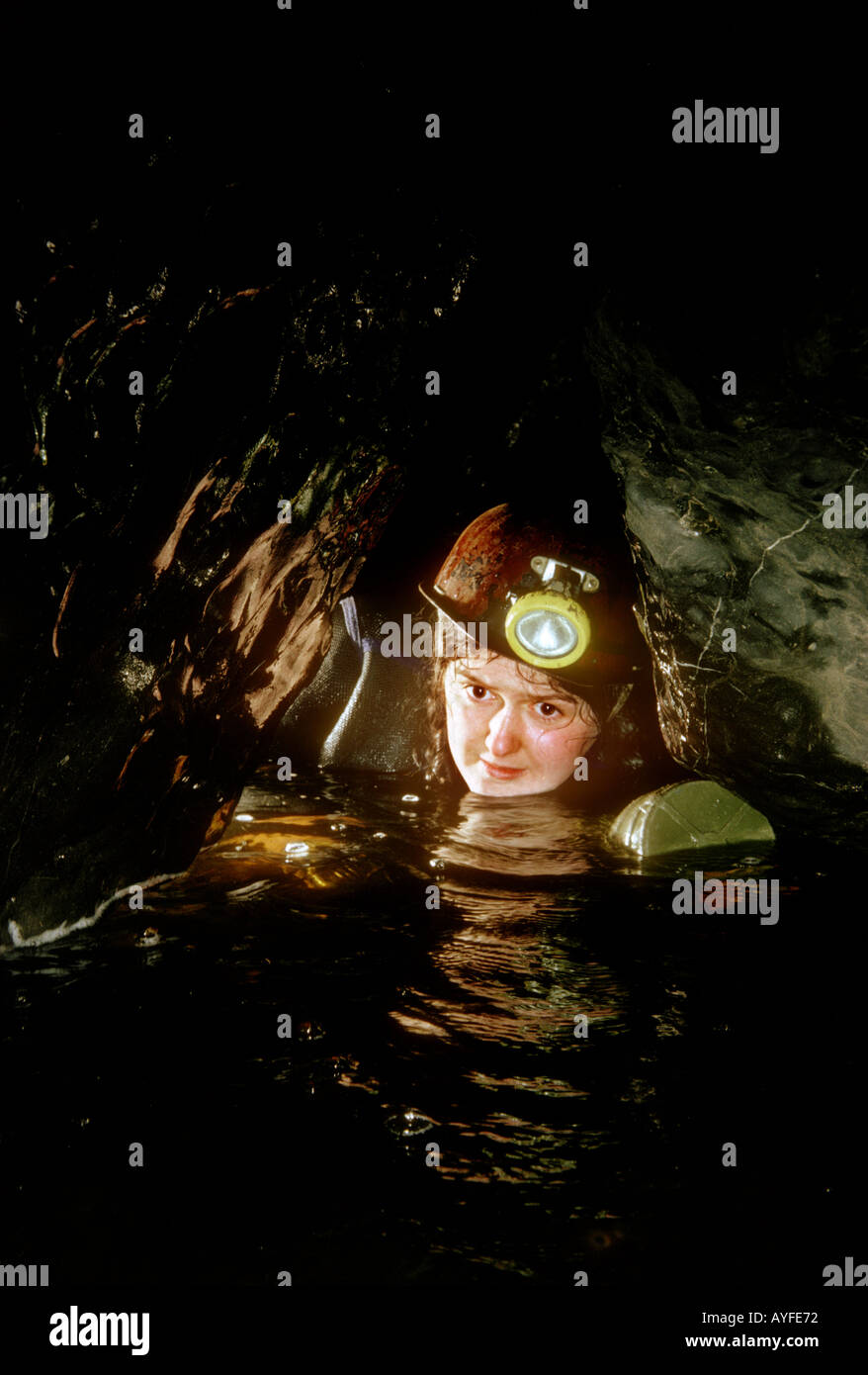 Female in black wetsuit hi-res stock photography and images - Alamy