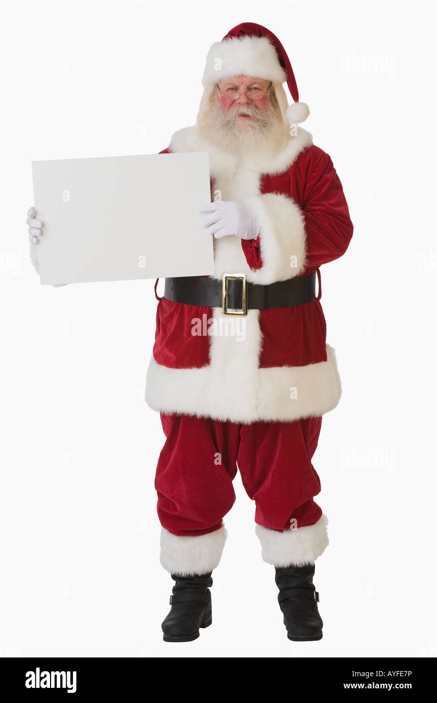 Santa Claus holding blank sign Stock Photo - Alamy