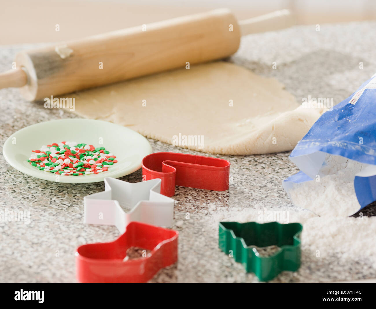 Cookie dough and cookie cutters on counter Stock Photo - Alamy
