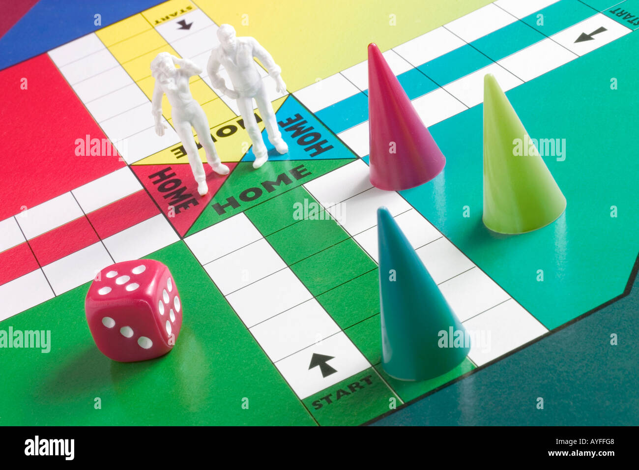 Miniature Figures with Red Dice and Game Pegs on Game Board Stock Photo ...
