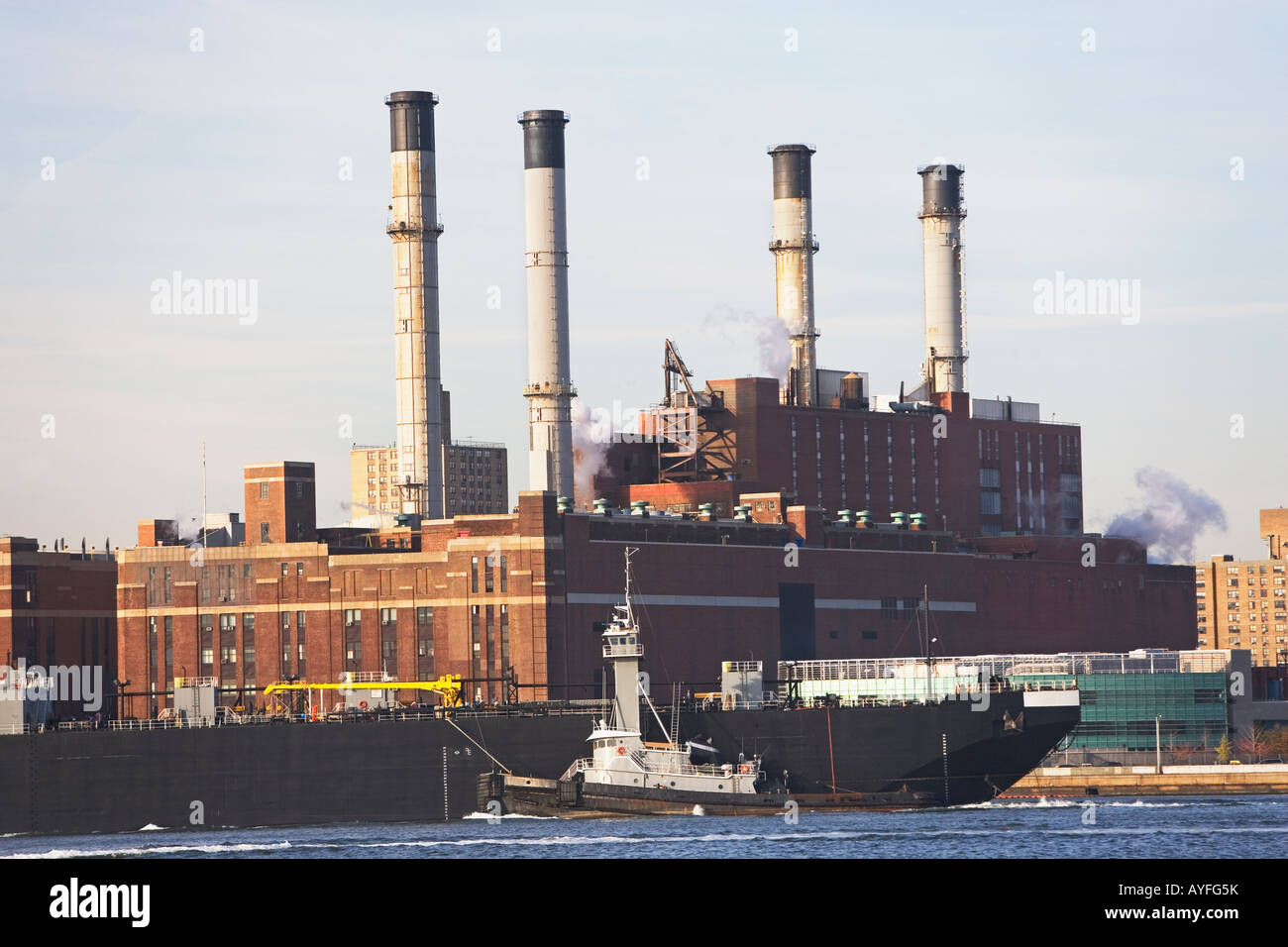 smokestacks and barge Stock Photo - Alamy