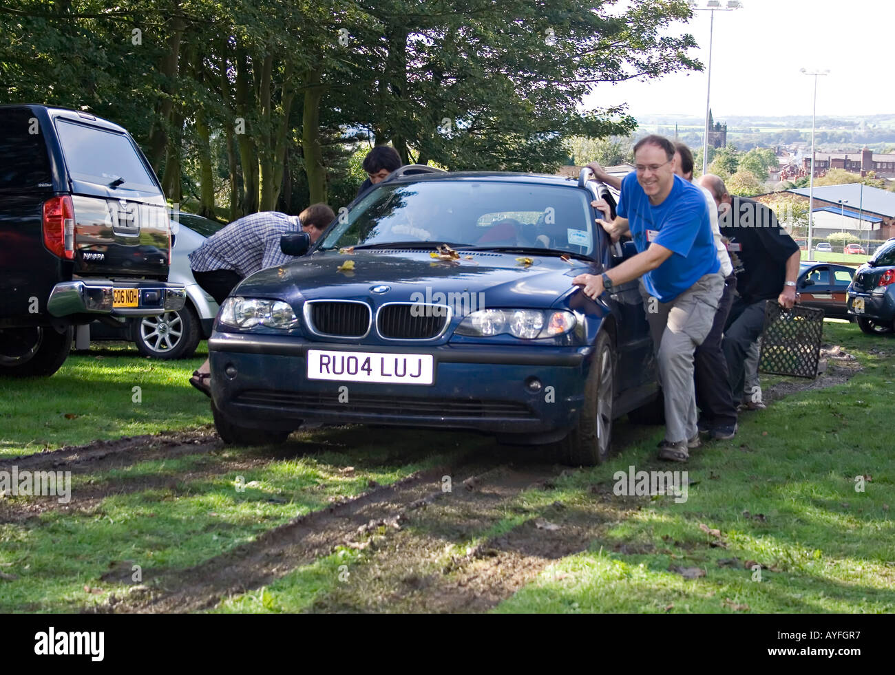 Push car stuck mud hi-res stock photography and images - Alamy